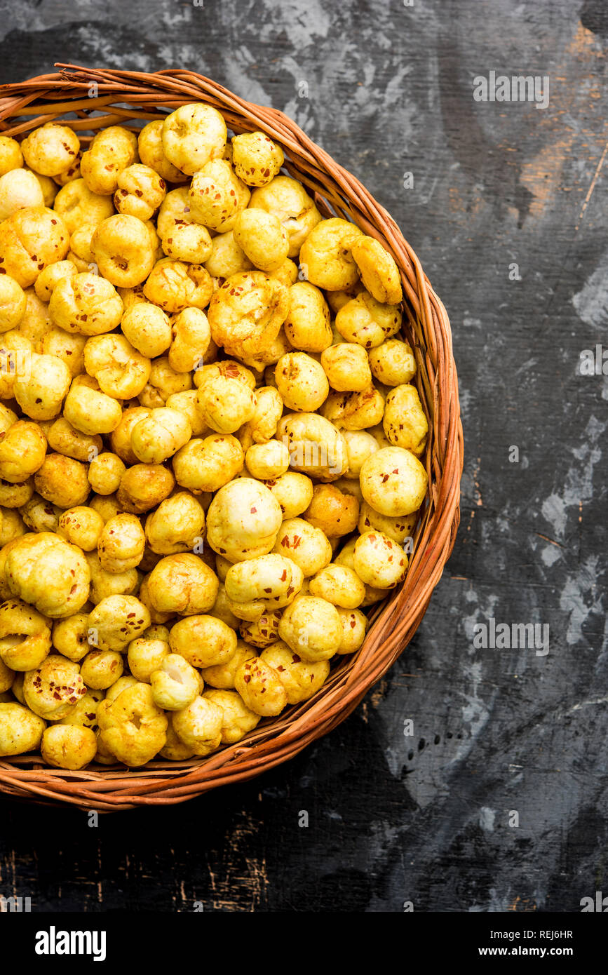 Roasted Phool Makhana or Crispy Lotus pops Seed served in a bowl ...