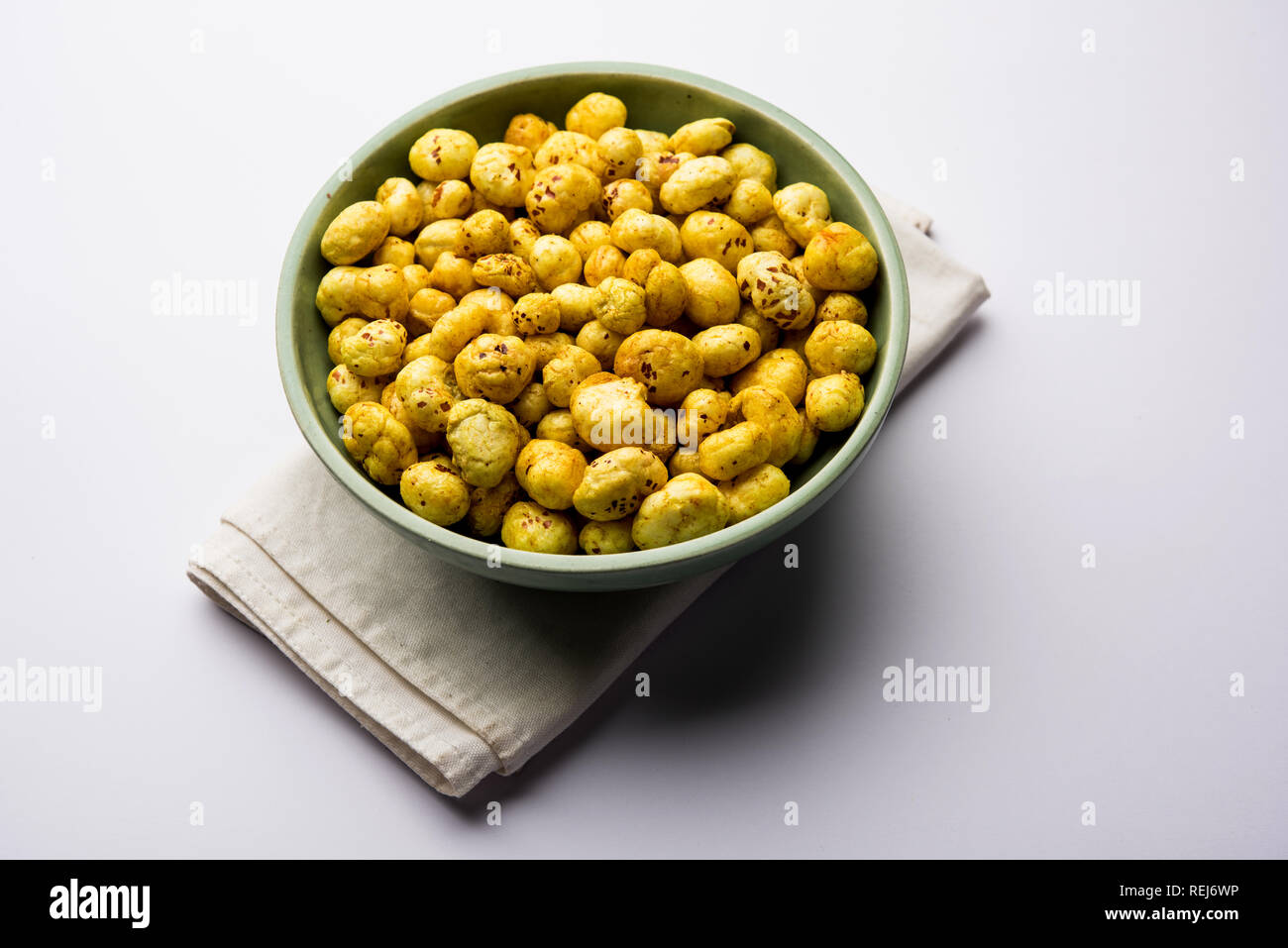 Roasted Phool Makhana or Crispy Lotus pops Seed served in a bowl ...