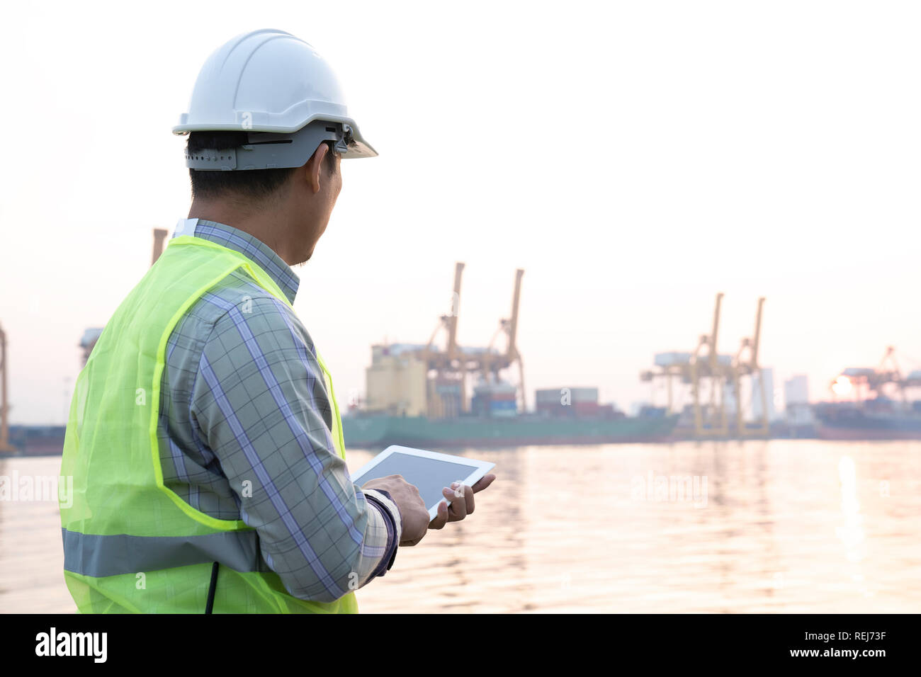 man inspect container in port - Image Stock Photo - Alamy