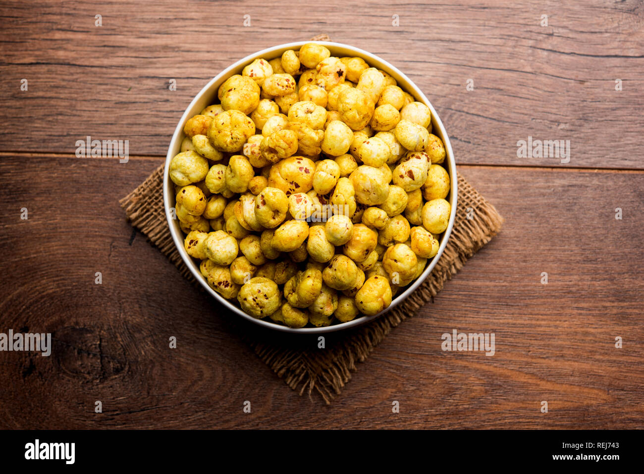 Roasted Phool Makhana or Crispy Lotus pops Seed served in a bowl ...