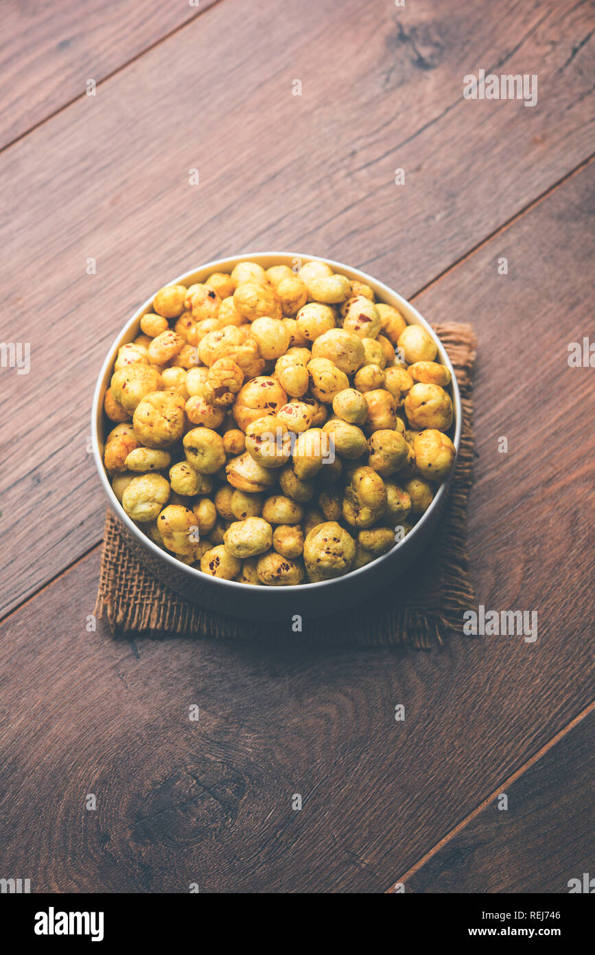 Roasted Phool Makhana or Crispy Lotus pops Seed served in a bowl ...