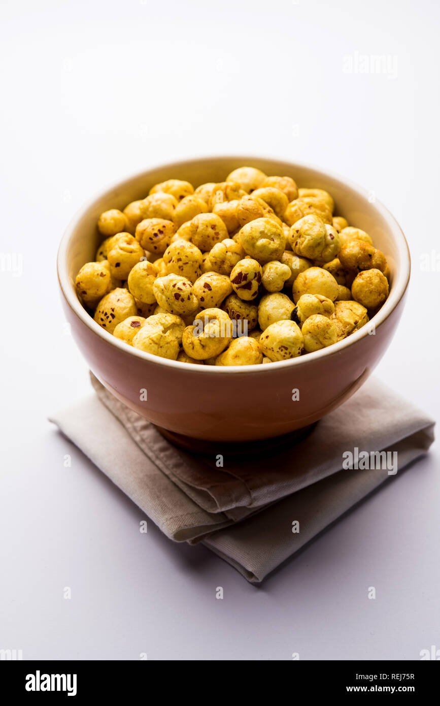 Roasted Phool Makhana or Crispy Lotus pops Seed served in a bowl ...