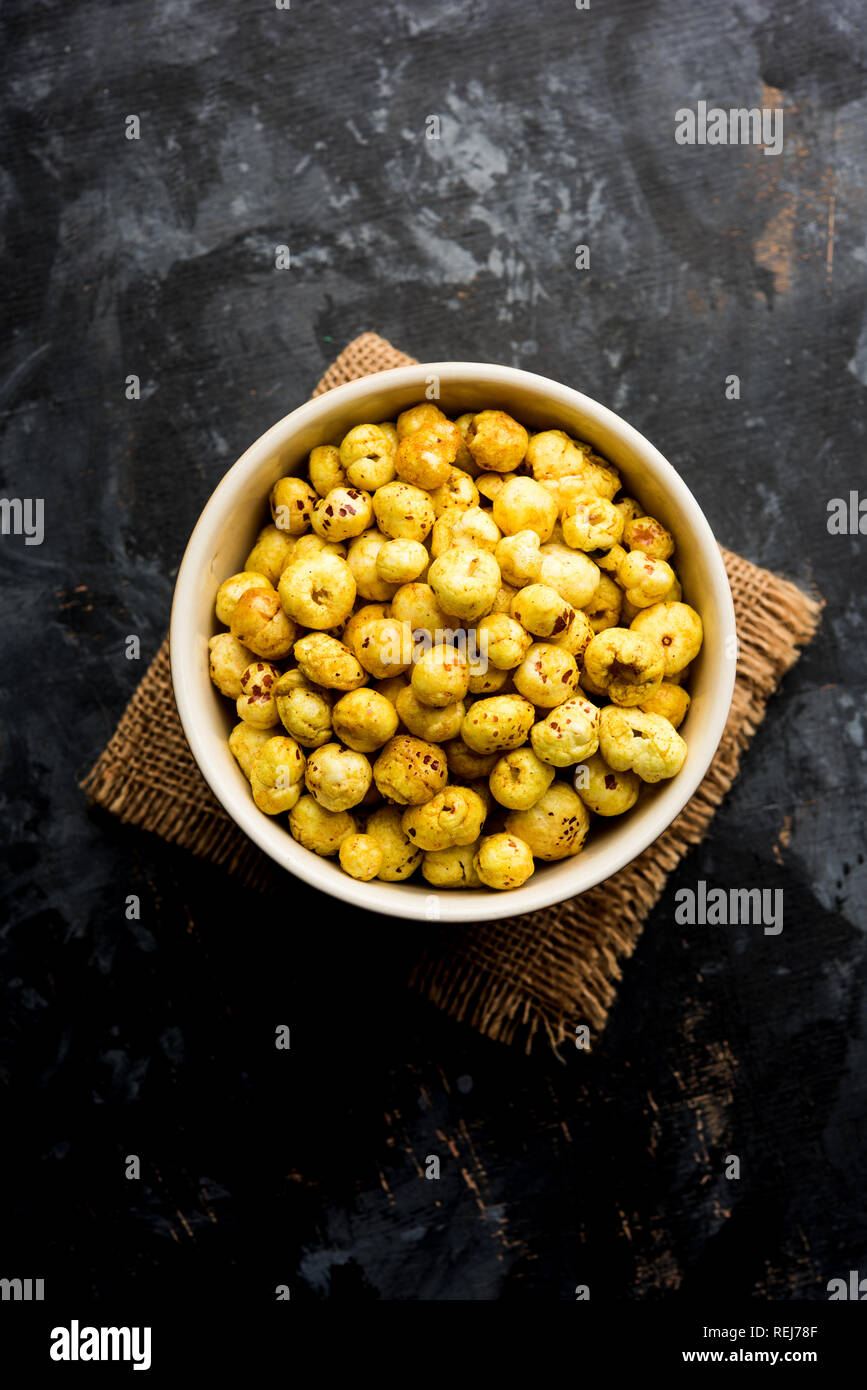 Roasted Phool Makhana or Crispy Lotus pops Seed served in a bowl ...