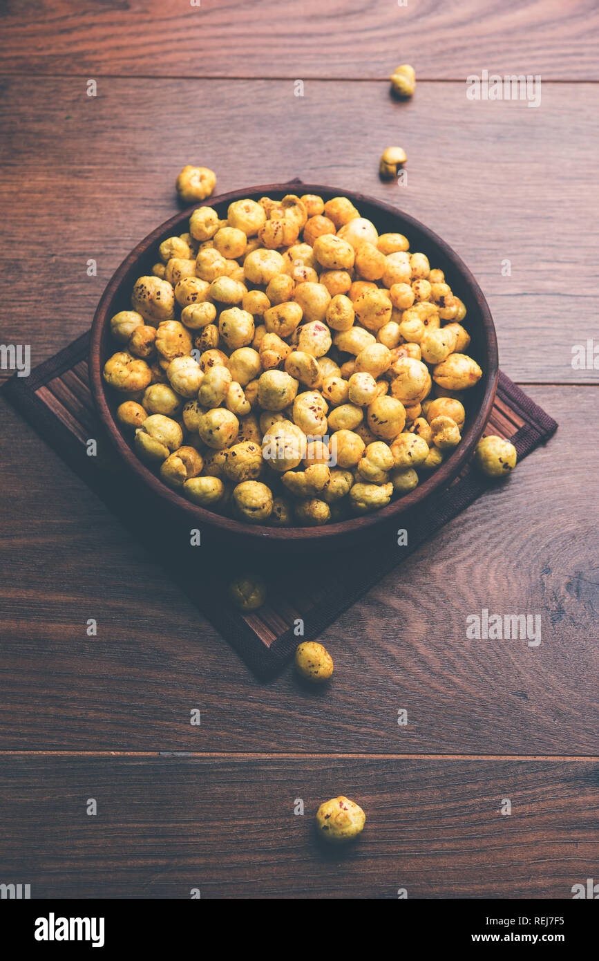 Roasted Phool Makhana or Crispy Lotus pops Seed served in a bowl ...