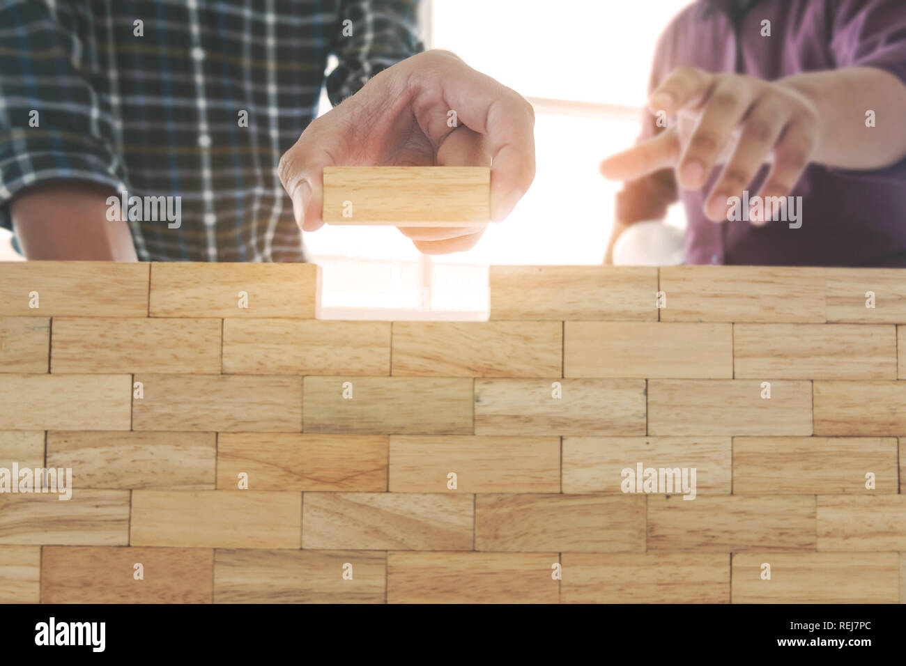 Hand placing brick hi-res stock photography and images - Alamy