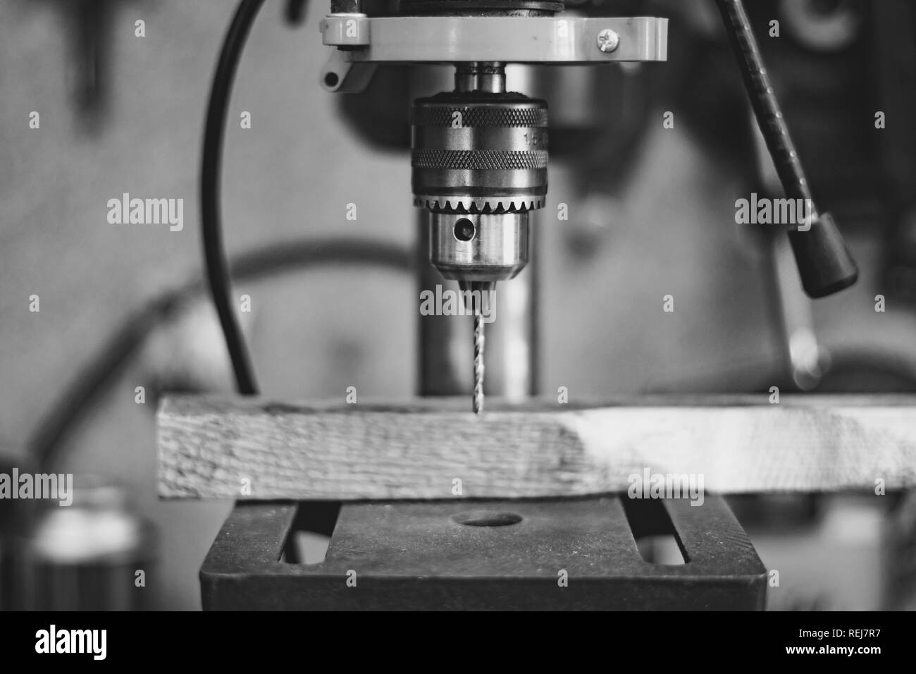 Drilling machine in factory workshop Stock Photo - Alamy