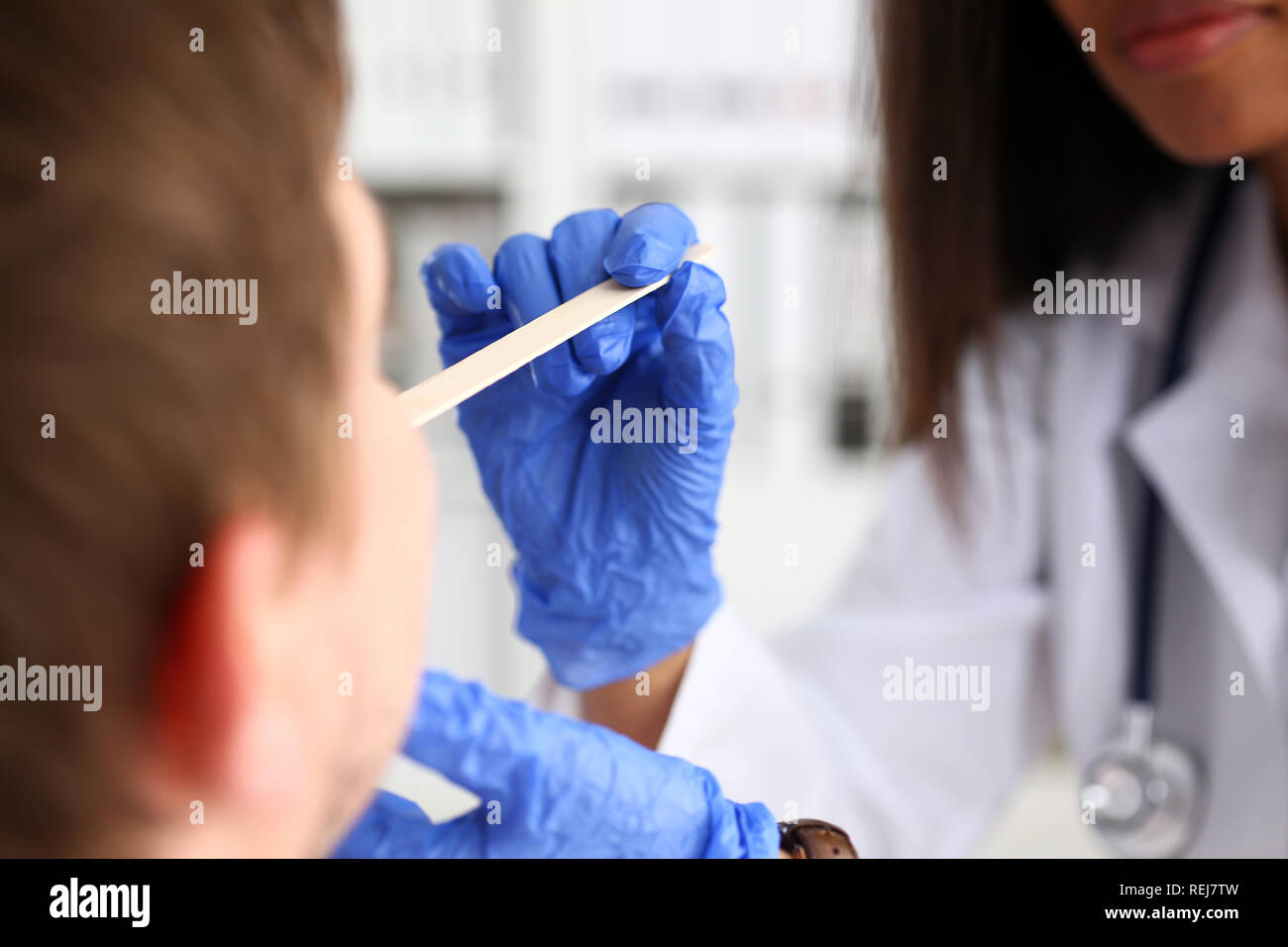 Beautiful black smiling female doctor talk with Stock Photo - Alamy