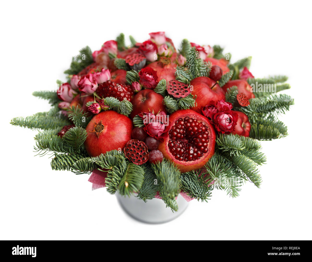 Huge edible fruit bouquet consisting of pomegranates, apples, grapes ...