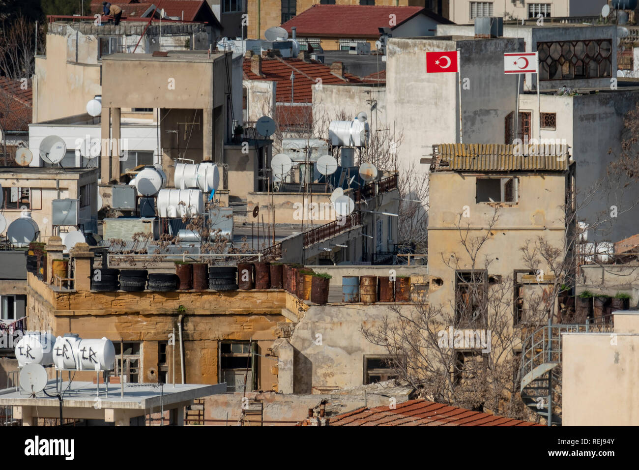 A view of damaged buildings on the buffer zone that separates the Greek ...