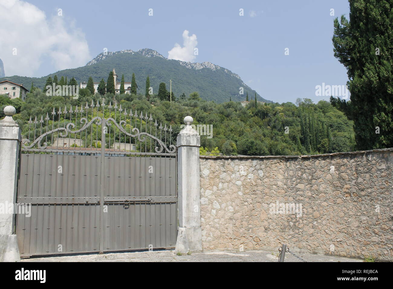 ancient stone gate on the lake in Italy Stock Photo - Alamy