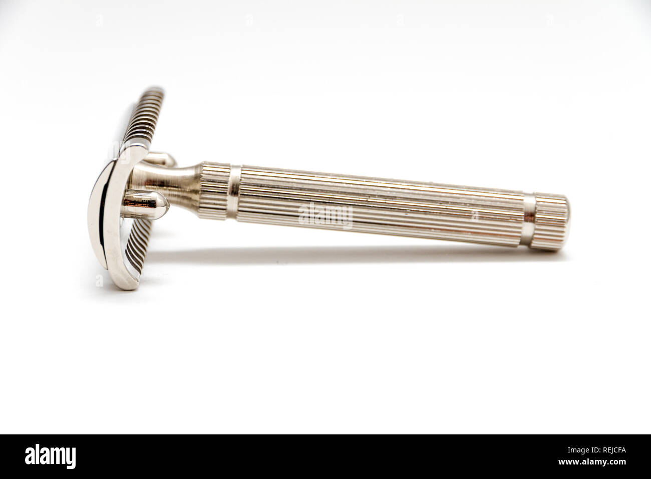 Traditional double edge open comb safety razor isolated on white ...