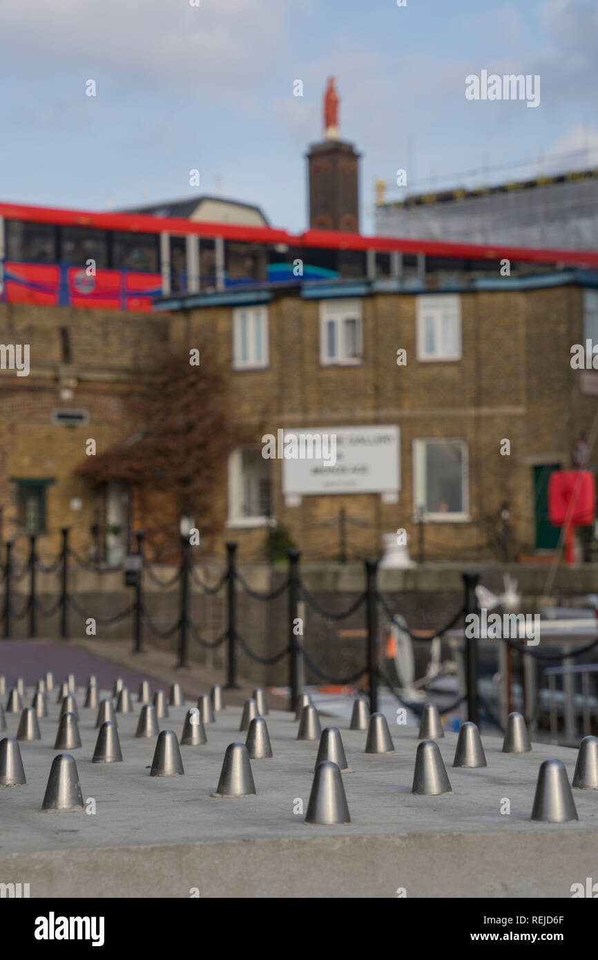 Anti-homeless spikes and rough surfaces installed in a luxury housing ...
