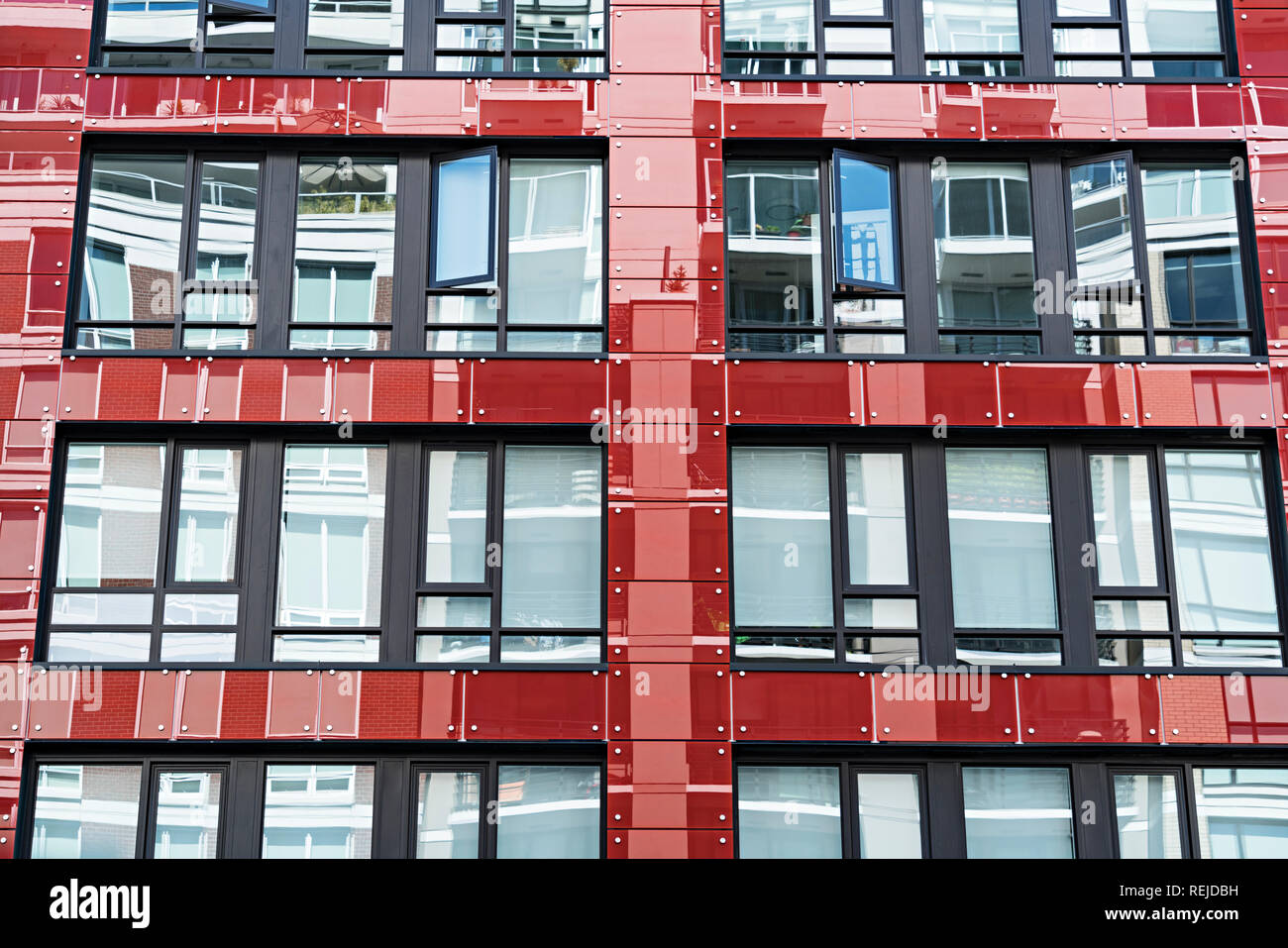 Modern building red windows hi-res stock photography and images - Alamy