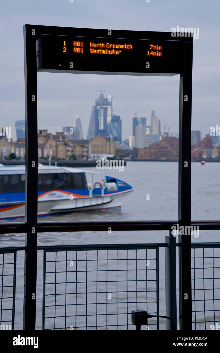 River Thames passenger ferry services by Canary Wharf, London, England ...