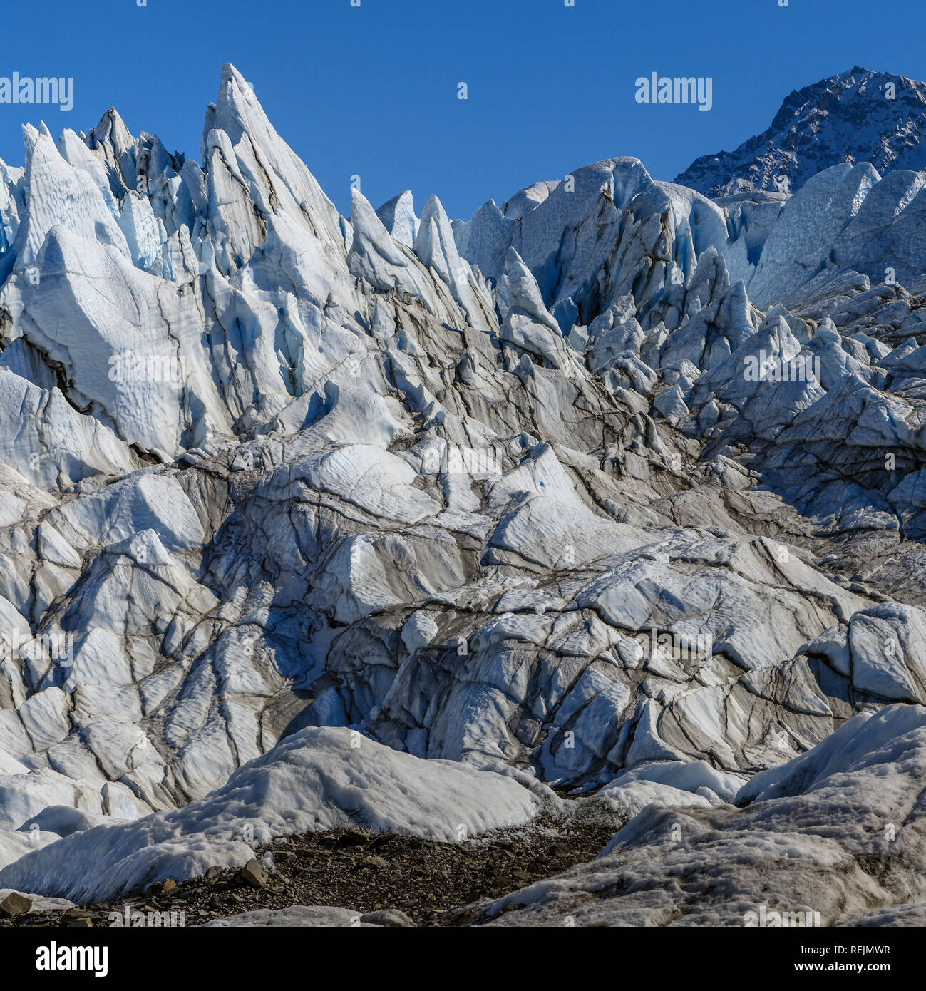 Sharp pinnacles of ice thrust up from the surface of Matanuska Glacier ...