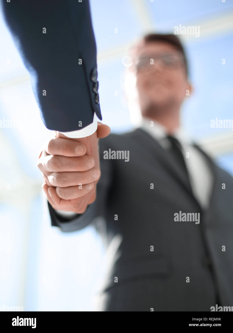 handshake partners in the office Stock Photo - Alamy