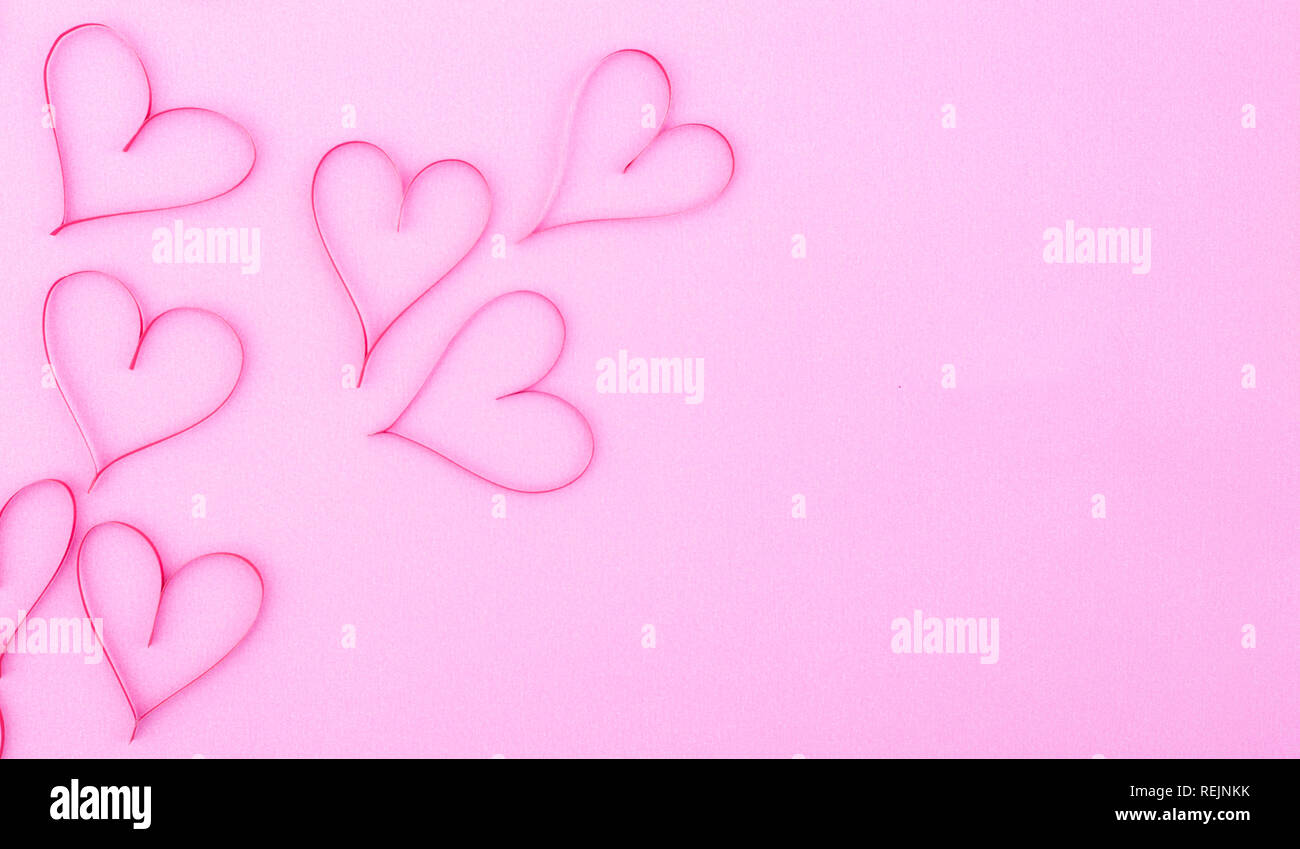 red heart shape on ping background Stock Photo - Alamy