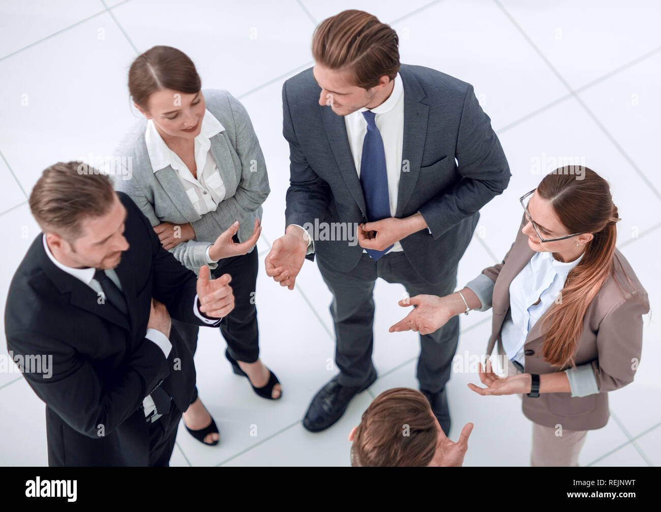 top view.a group of employees talking standing in the office Stock ...