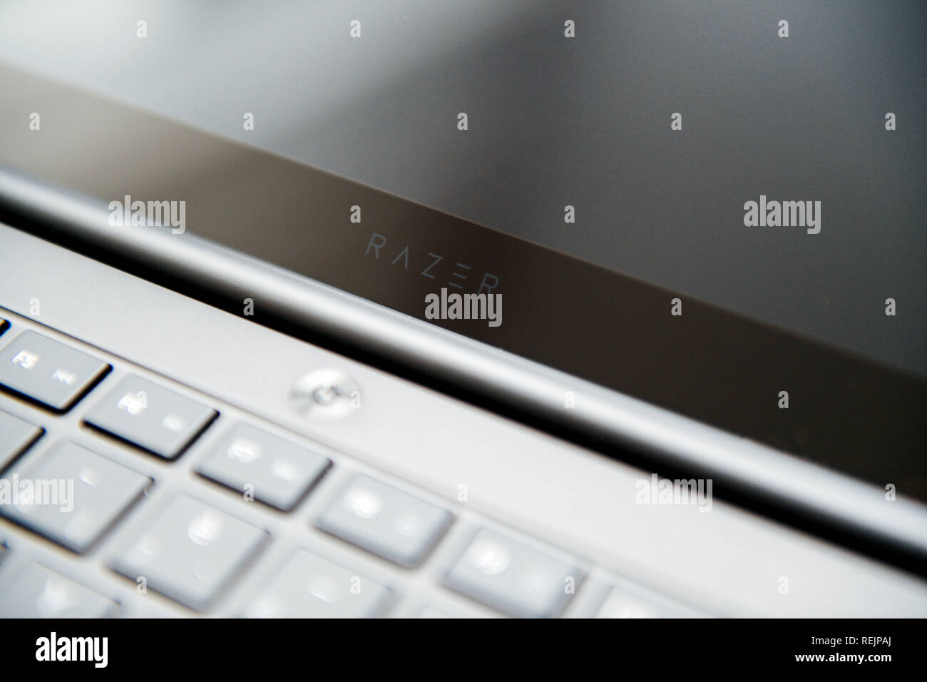 PARIS, FRANCE - JAN 10, 2018: Power on button on modern laptop shallow ...