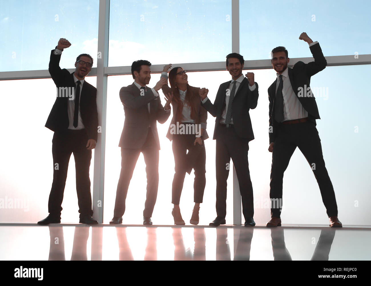 A group of people with great success holds Stock Photo - Alamy