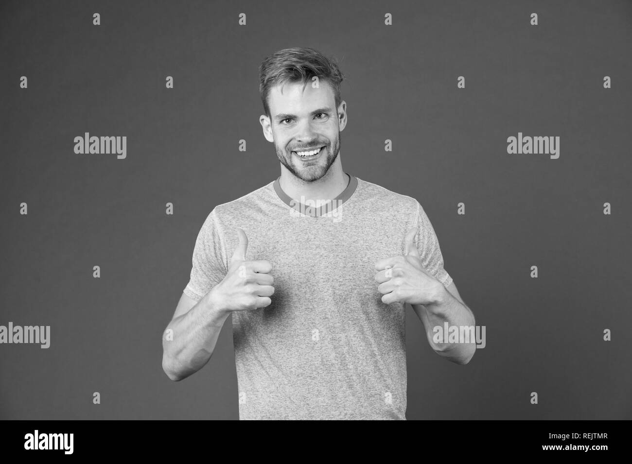 Approve or recommend concept. Man with brilliant smile unshaven face ...