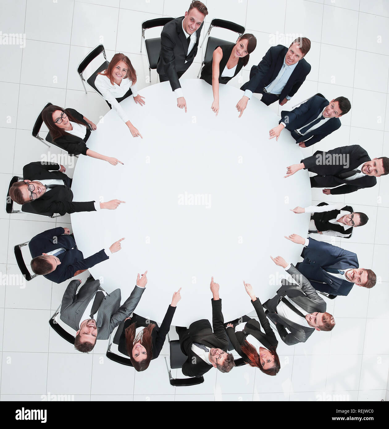 closeup .business team pointing in the center of the table Stock Photo ...