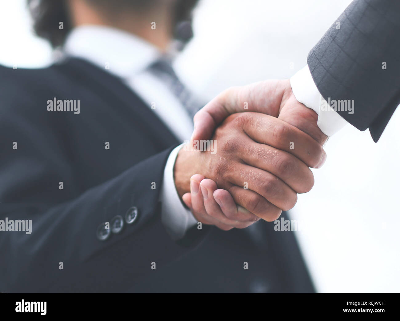 Handshake between two men in hi-res stock photography and images - Alamy