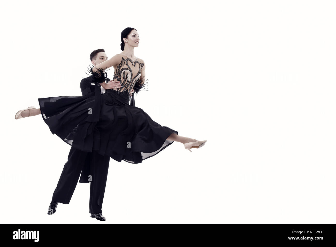 ballroom dance couple in a dance pose isolated on white background ...