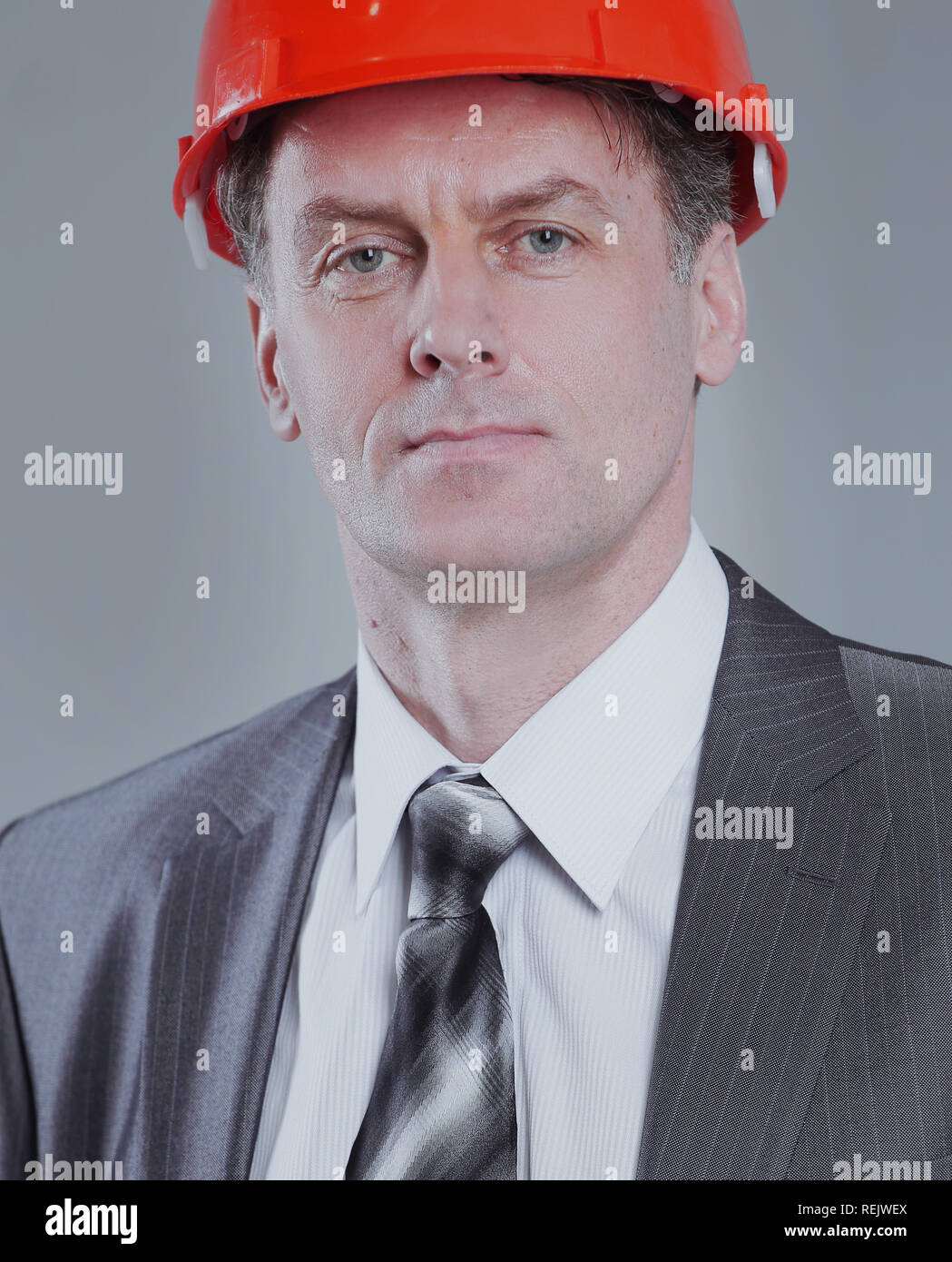 portrait of professional architect with the project of a new building ...
