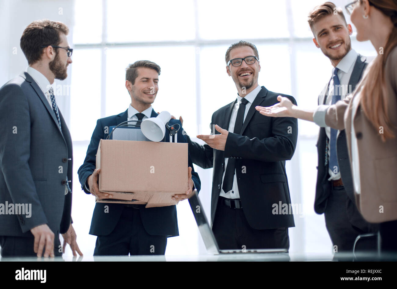 business group welcoming new employee Stock Photo - Alamy