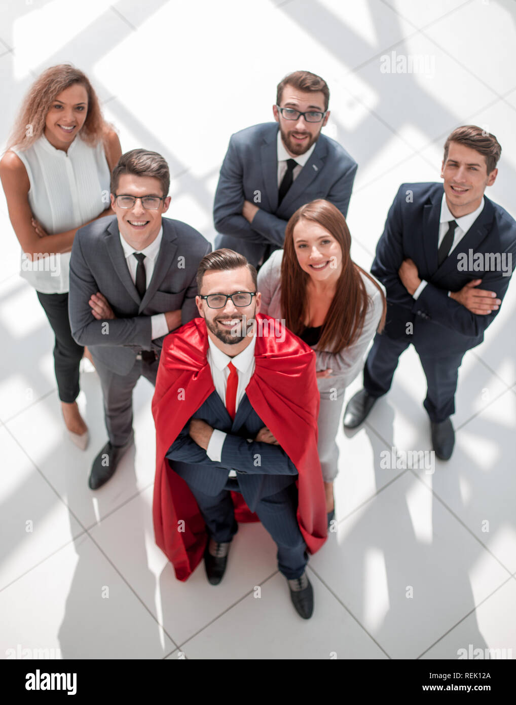 top view.businessman superhero and his young business team Stock Photo ...
