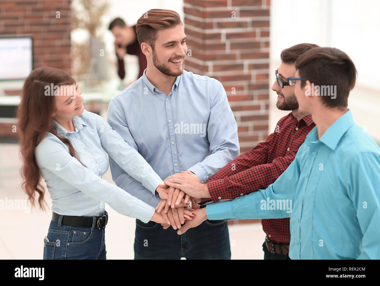 Group of people hands together partnership teamwork Stock Photo - Alamy