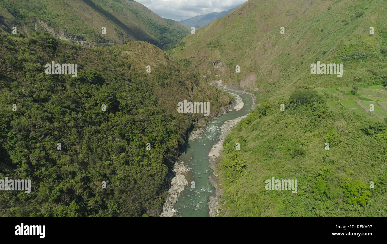 Aerial view of mountain river in the cordillera gorge, mountains ...