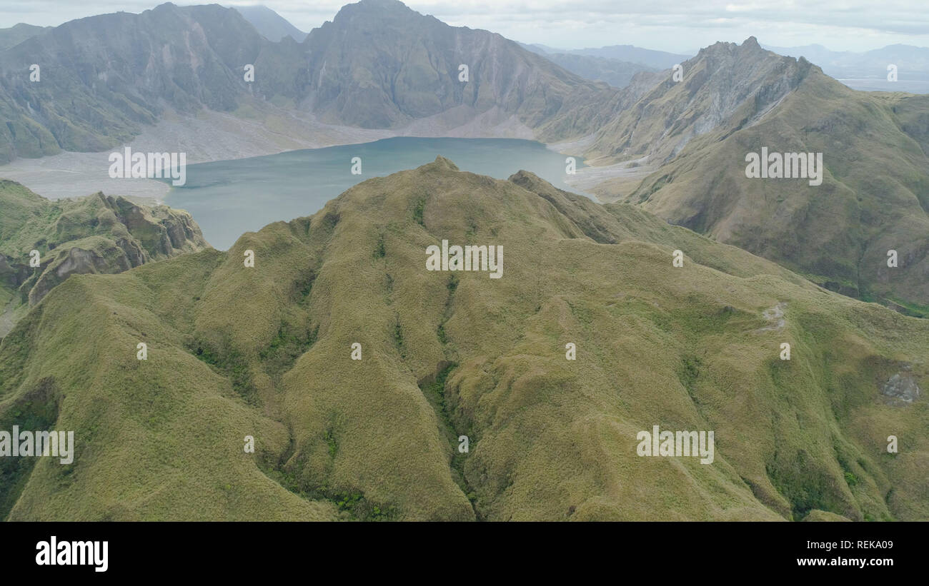 Crater lake of the volcano Pinatubo among the mountains, Philippines ...