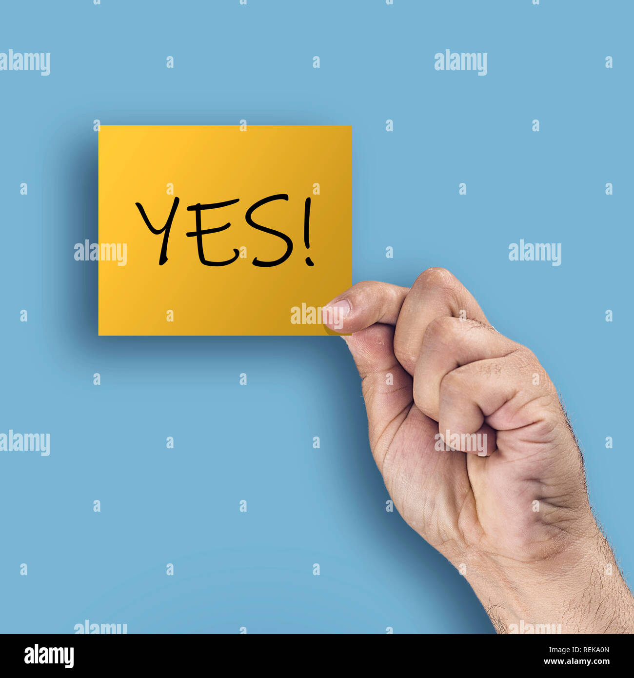 Yes text in sticker. Hand showing or holding sticker with text Stock ...