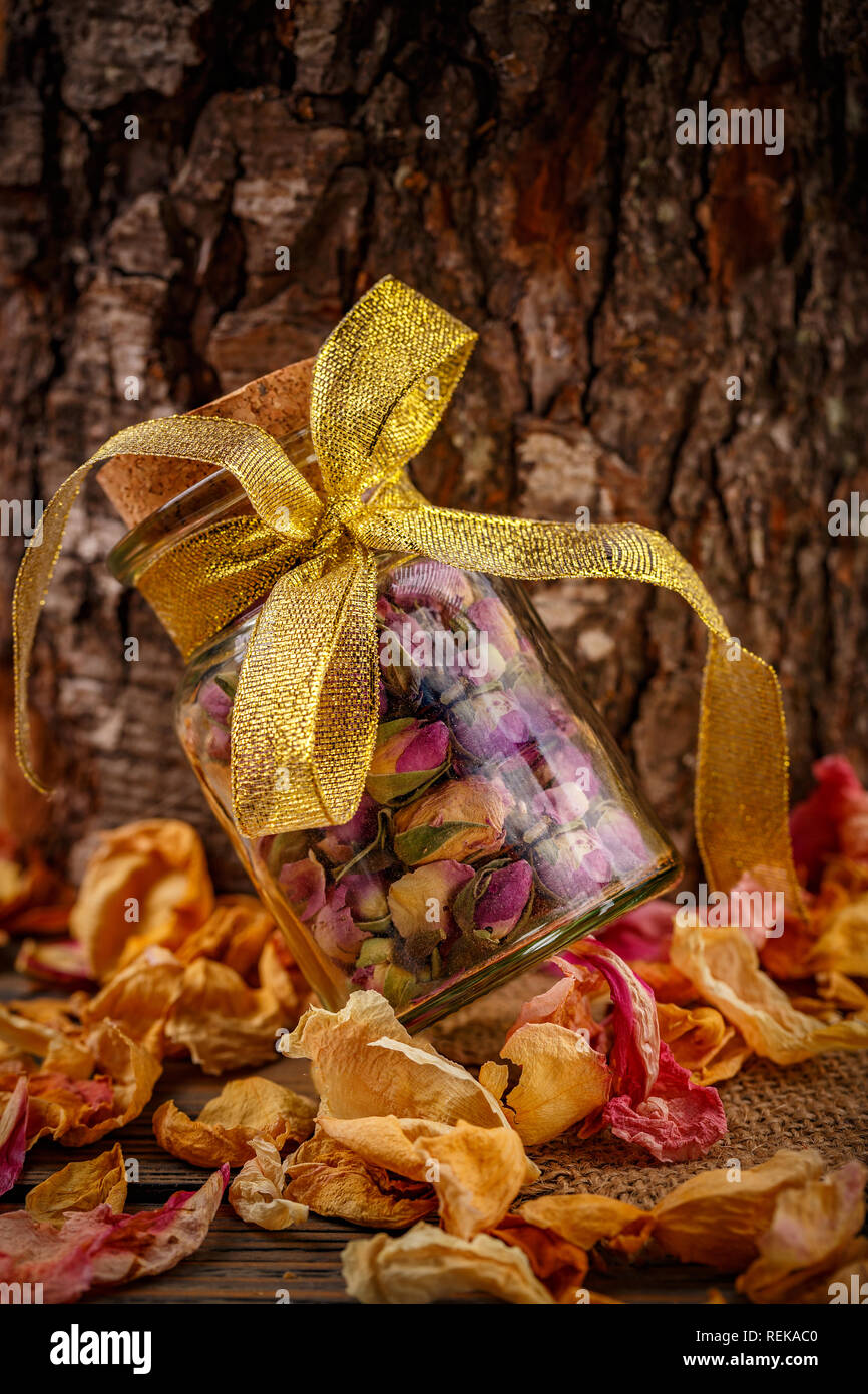 Flower tea rose buds in glass jar Stock Photo - Alamy