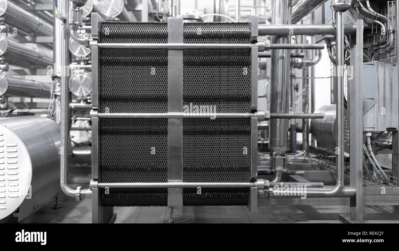 Cheese-making equipment of cheese factory background Stock Photo - Alamy