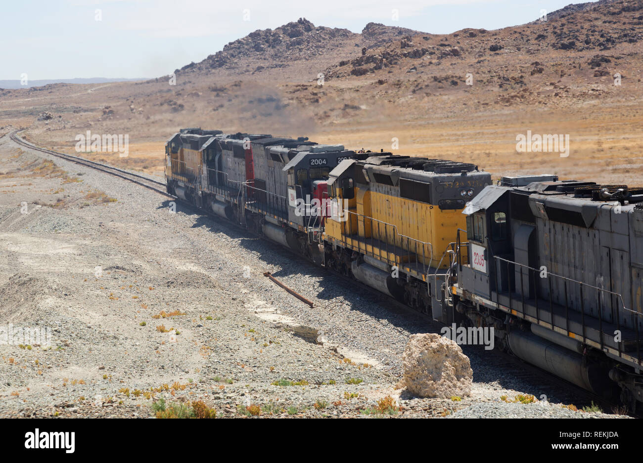 Trona Railroad moving cargo through Trona Pinnacles, California Stock ...