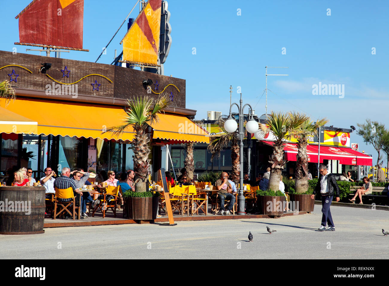 Cafes near the beach in Rimini Stock Photo - Alamy