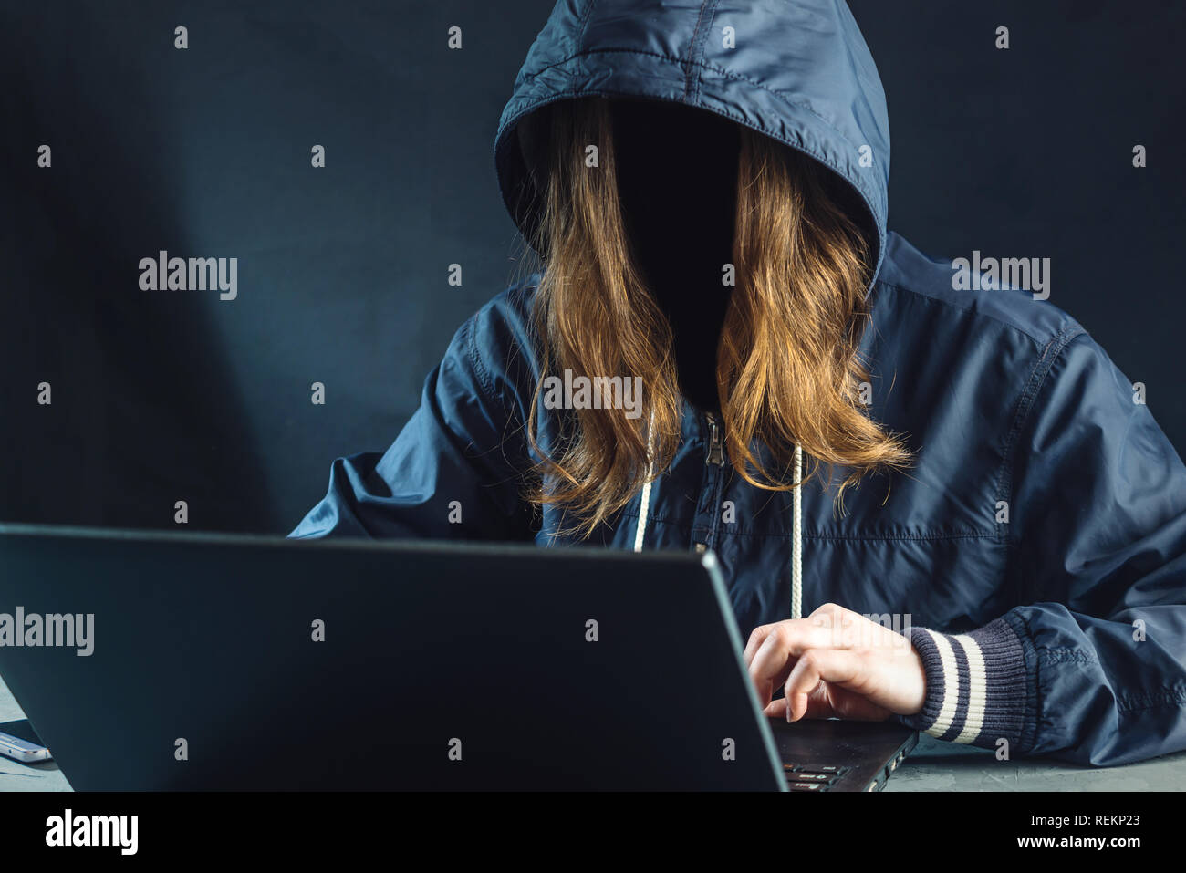 Girl hacker uses laptop hi-res stock photography and images - Alamy