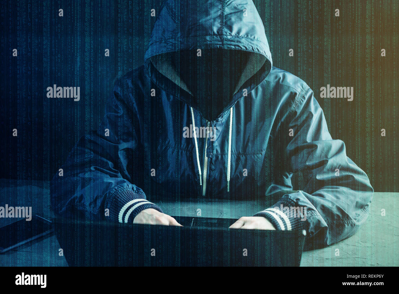 Anonymous Hacker Programmer Uses A Laptop To Hack The System Stealing