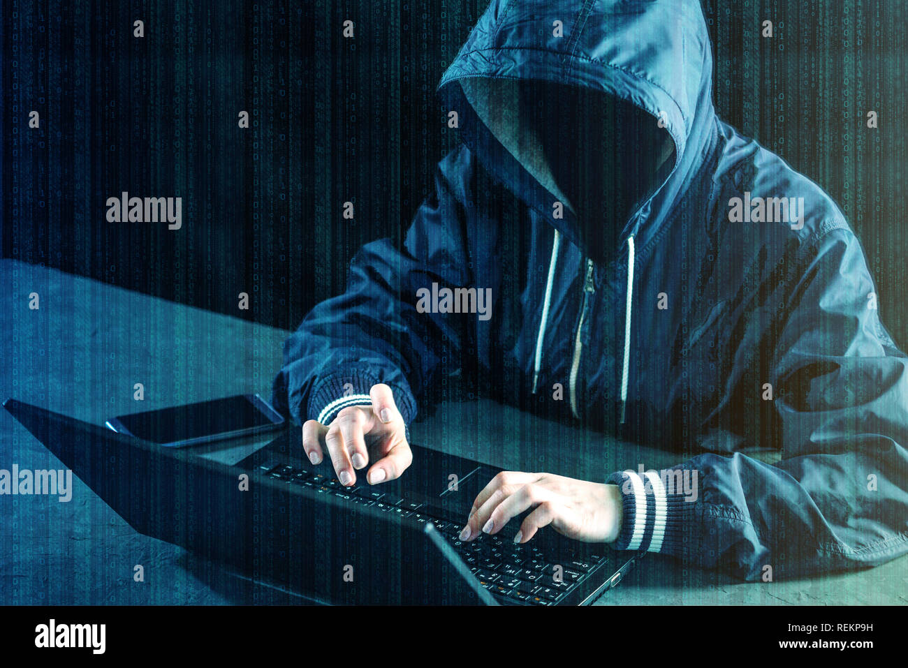 Anonymous Hacker Programmer Uses A Laptop To Hack The System Stealing