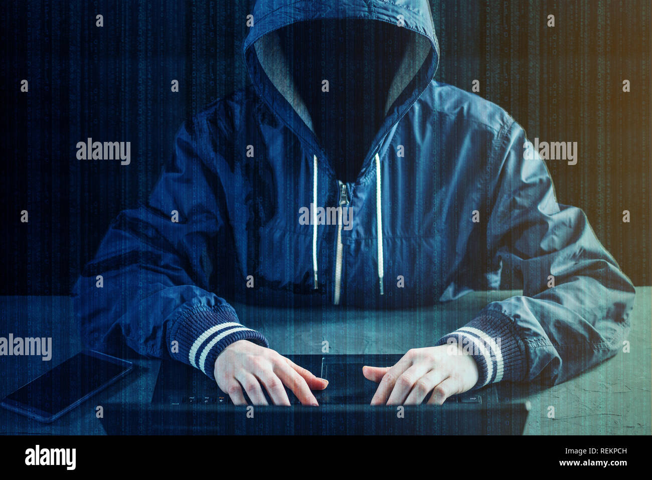 Anonymous Hacker Programmer Uses A Laptop To Hack The System Stealing