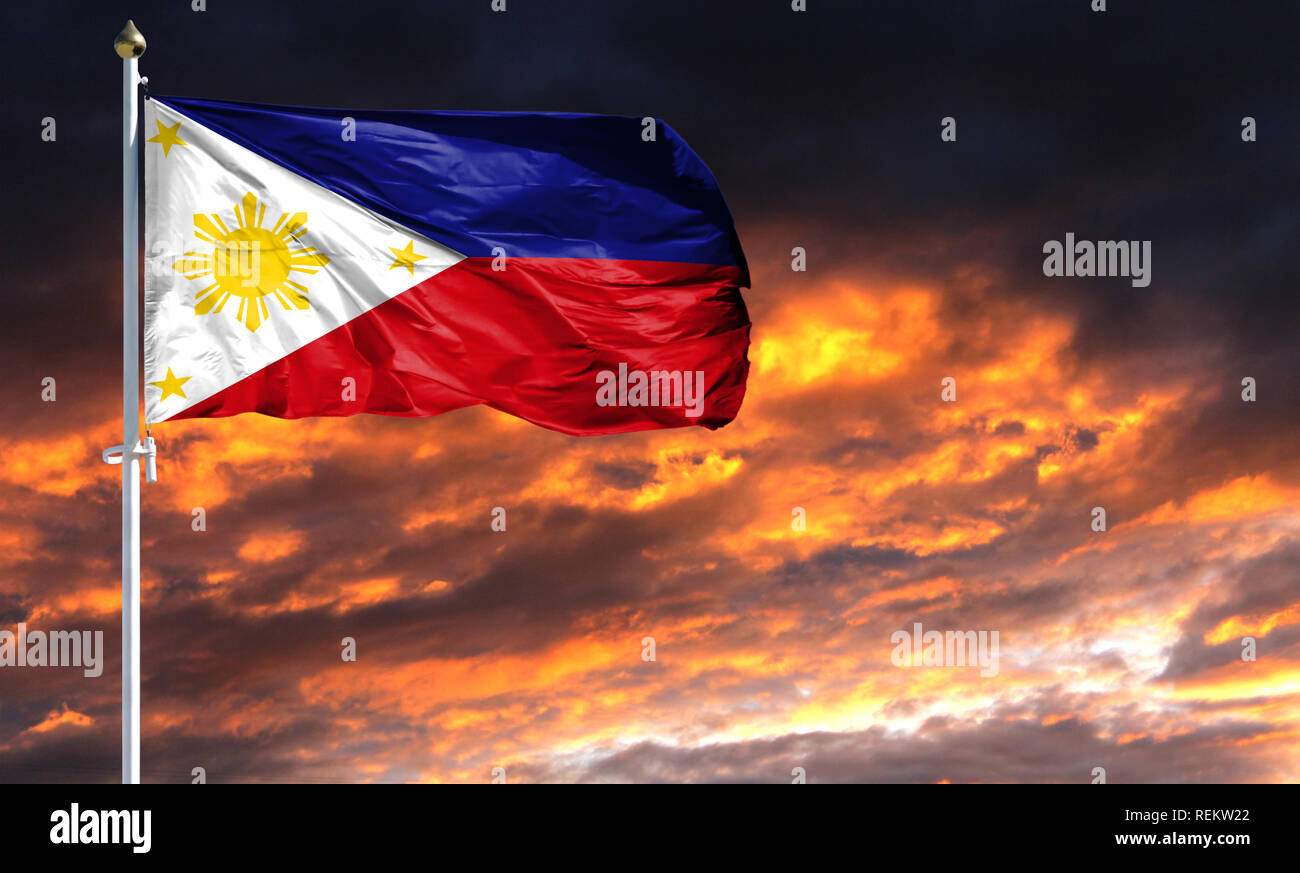 flag of Philippines on flagpole fluttering in the wind against a ...