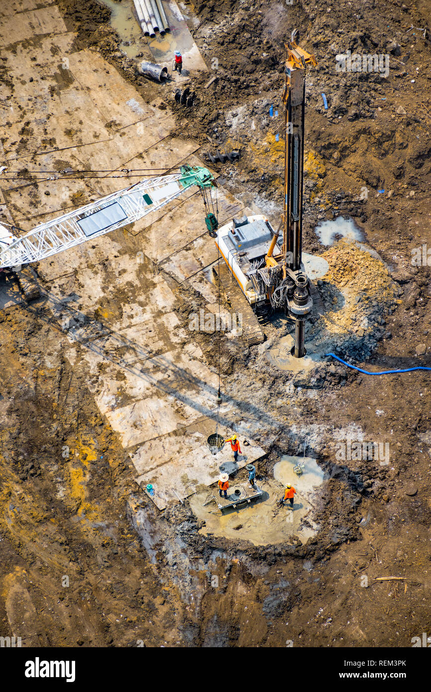 Aerial view of concrete bored pile foundation work on a construction ...