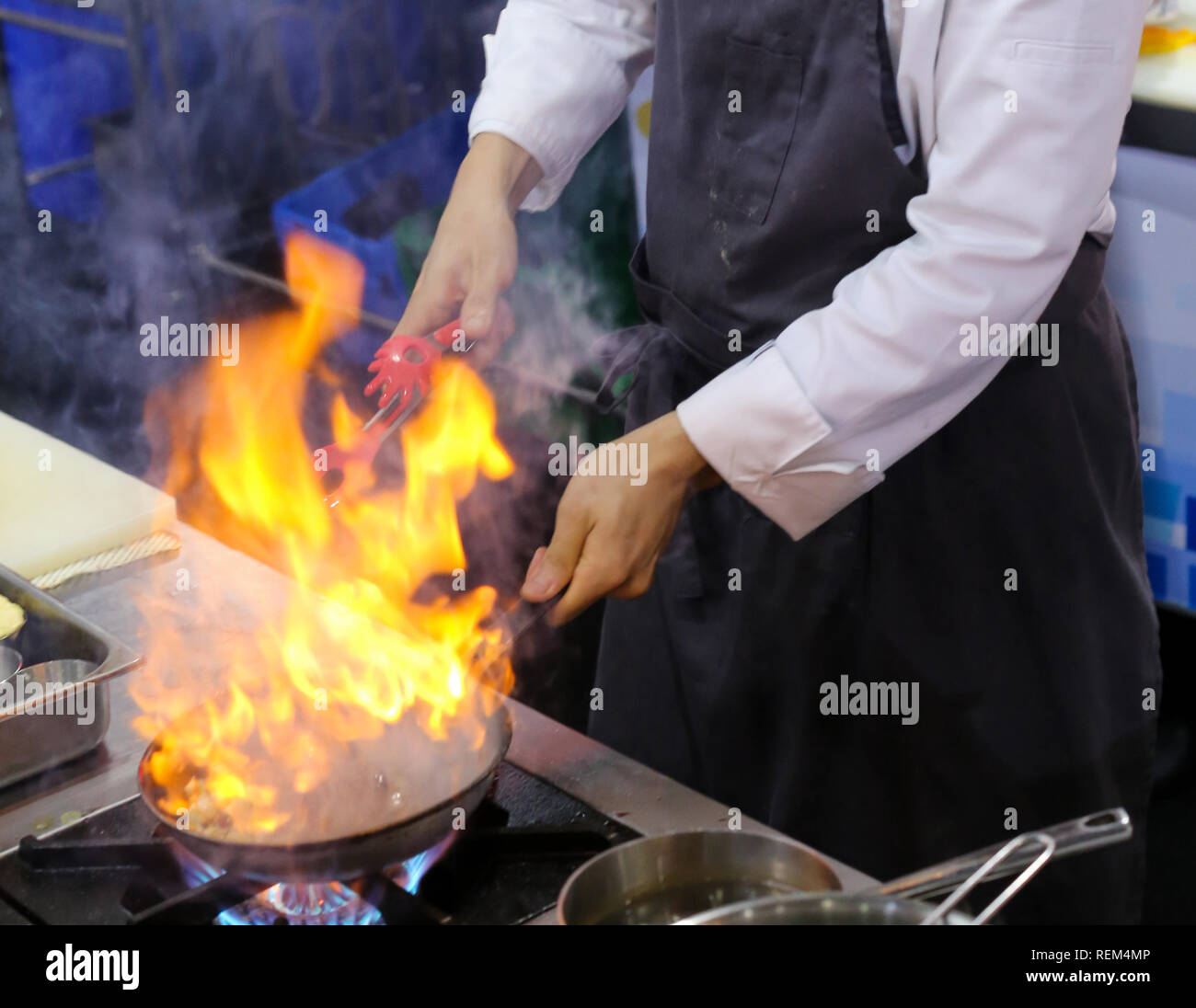 Chef hot oil burn hi-res stock photography and images - Alamy