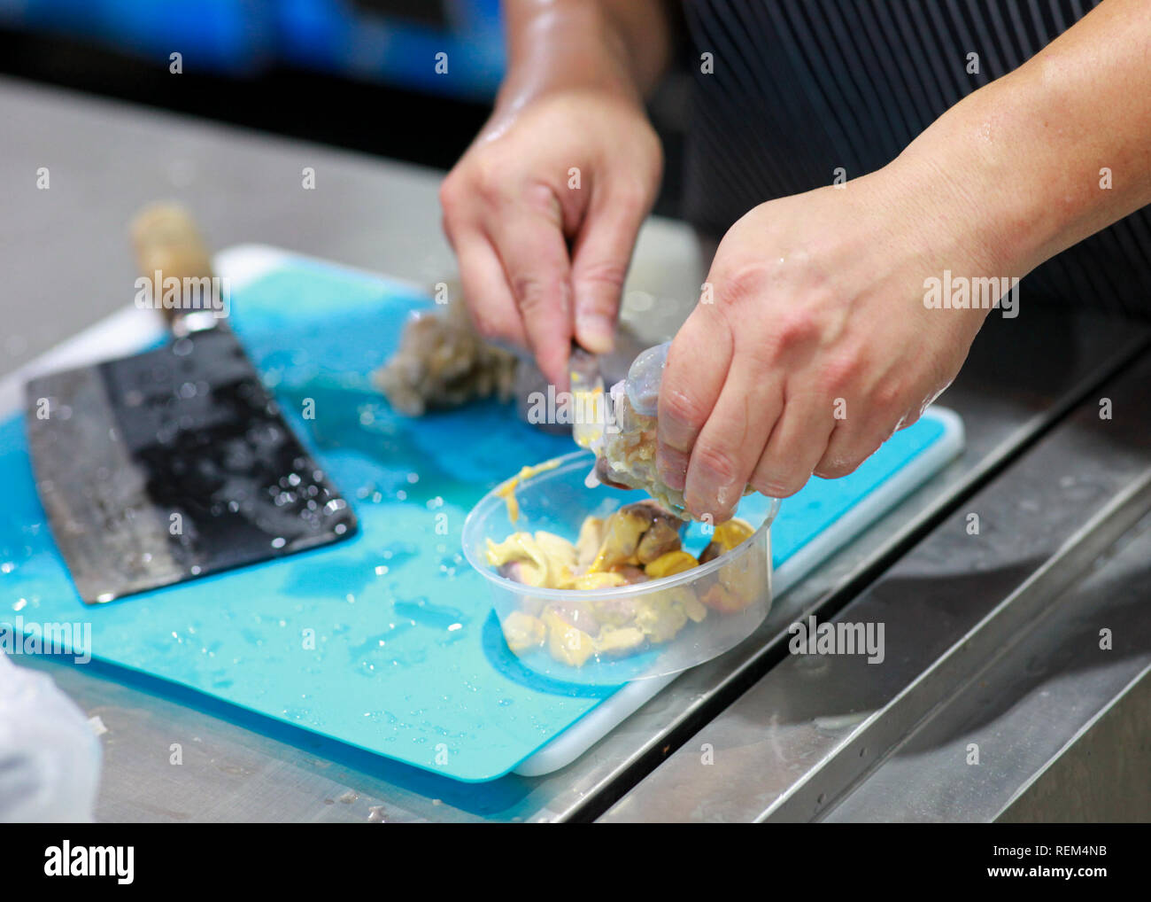 Chef cooking food in the kitchen, Chef preparing food Stock Photo - Alamy