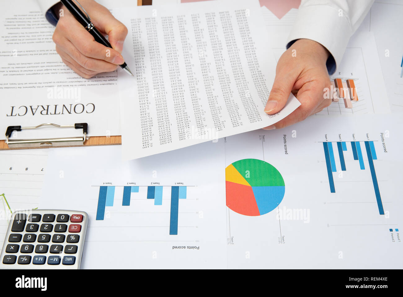 Workplace businessman. Contracts, charts, and graphs on the desk Stock ...