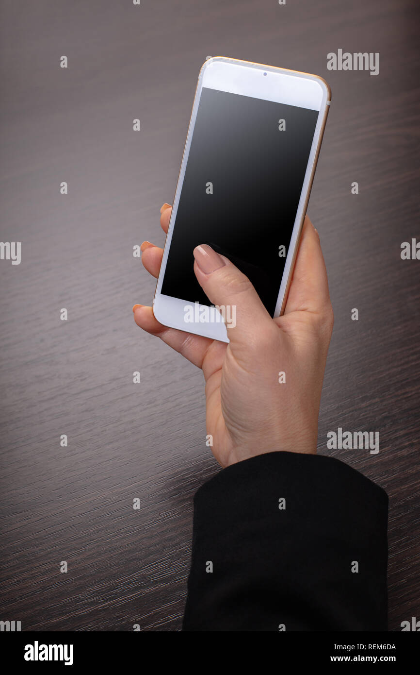 Female hand holding iphone hi-res stock photography and images - Alamy