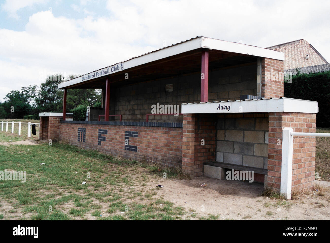 Covered area and dugouts at Mundford FC Football Ground, The Glebe, St ...